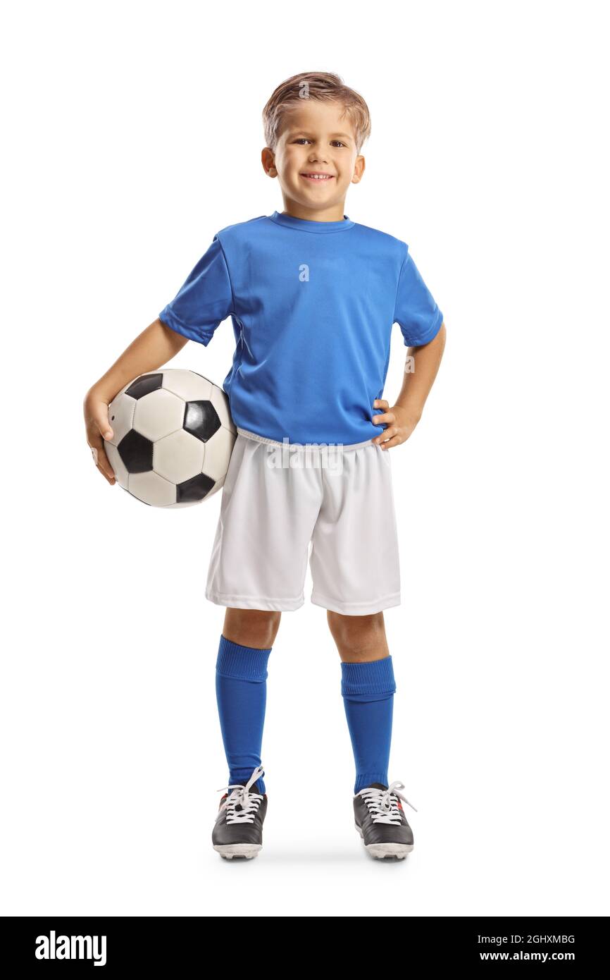 Full length portrait of a happy boy in a football jersey posing with a ...
