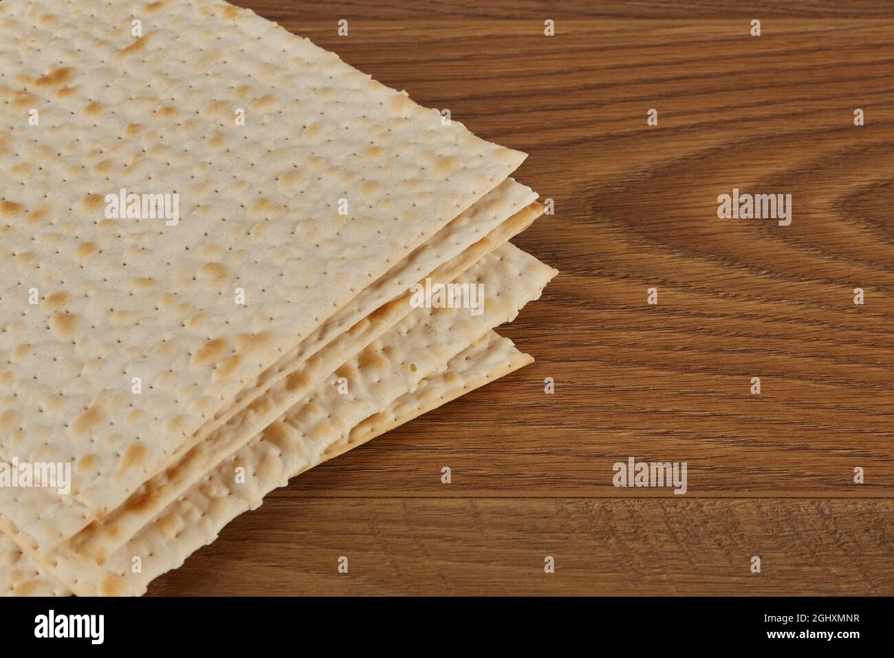 Traditional kosher Jewish matzah for the holiday of Passover lies on a ...