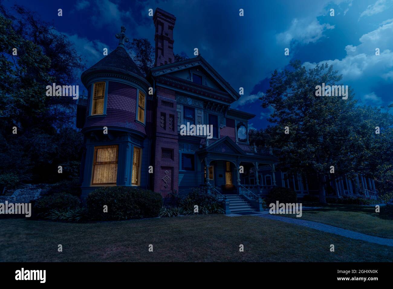 Victorian house by moon light Stock Photo - Alamy