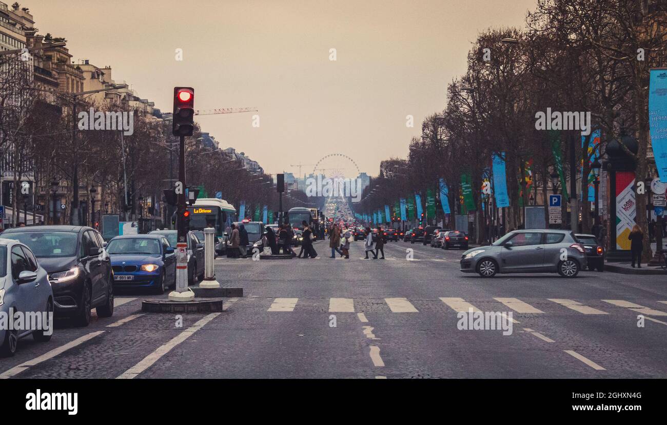 PARIS, FRANCE - Jan 04, 2018: A shot of a busy street with crosswalks ...