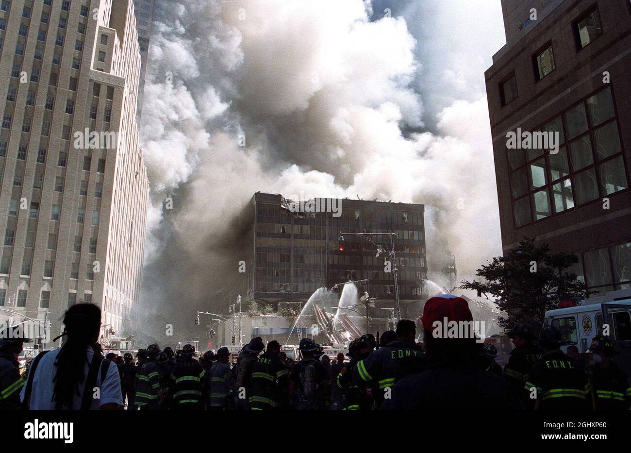 New York, USA. 11th Sep, 2001. Rescue crews work next to the WTC after ...
