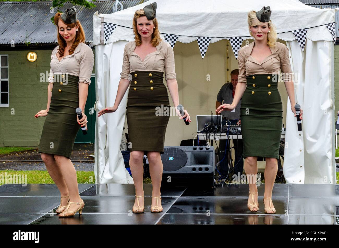 Manhattan Dolls singing in England at a military revival event. Female ...