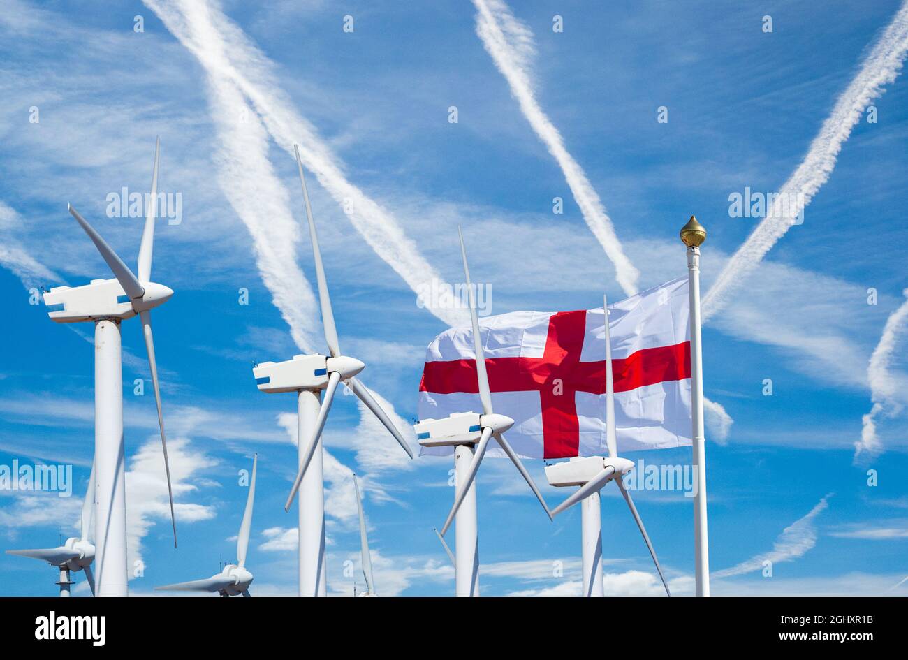 Wind turbines concept UK. Wind turbines and flag of England against ...