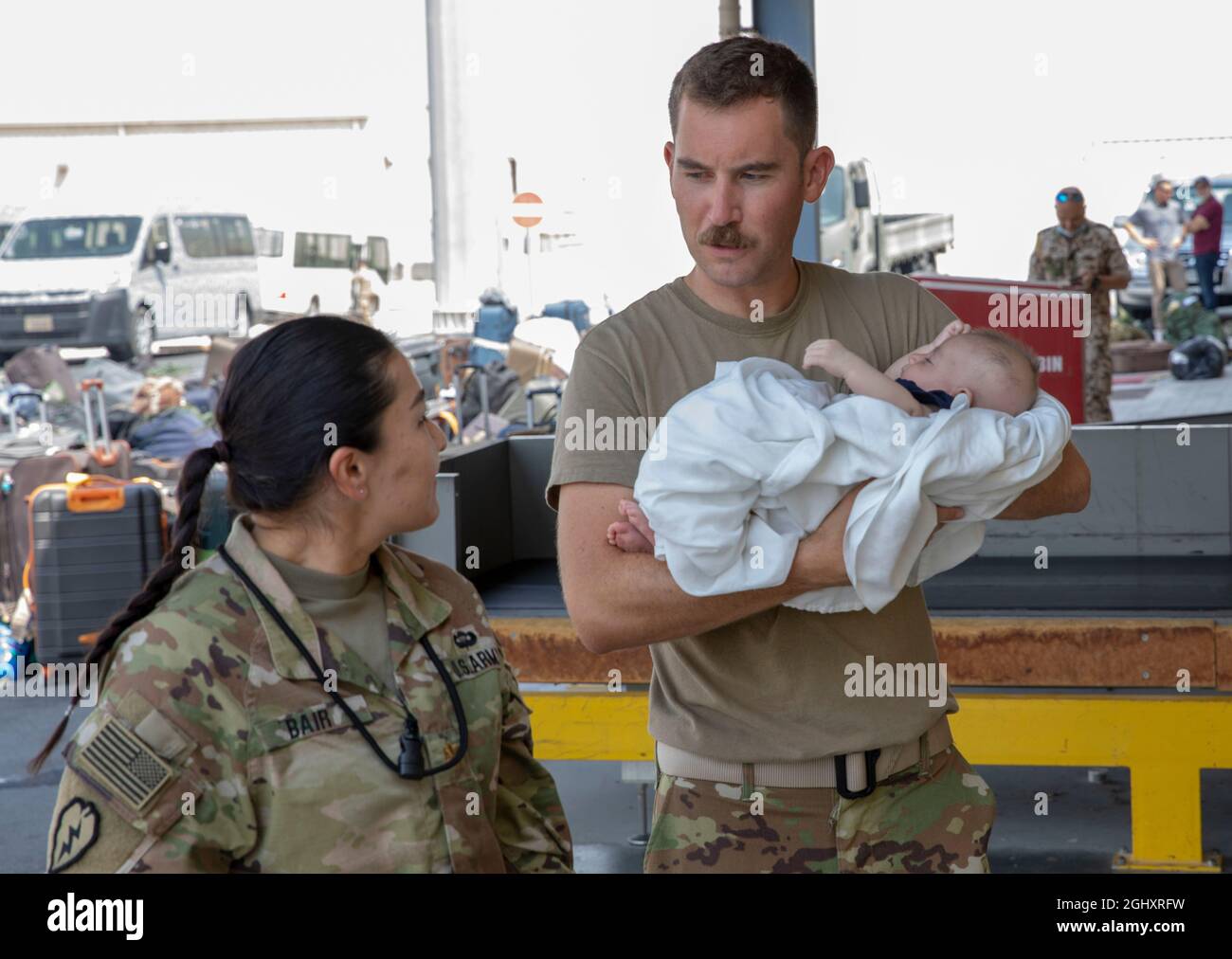 U.S. Air Force Cpt. Zach Vadnais (right), a pilot with the 91st ...