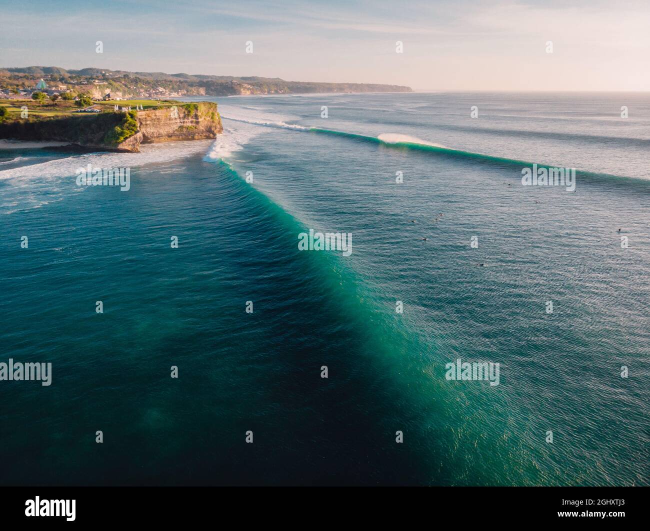 Aerial view with surfing waves. Biggest ocean waves in Bali Stock Photo ...