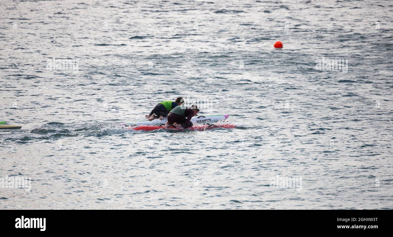 People laying next to canoe hi-res stock photography and images - Alamy
