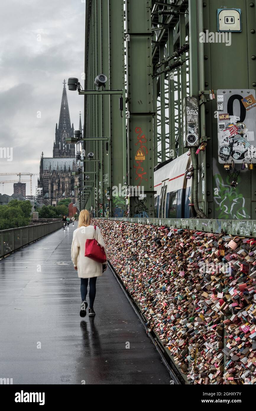 The Hohenzollern Bridge with love locks in Cologne, Germany Stock Photo ...