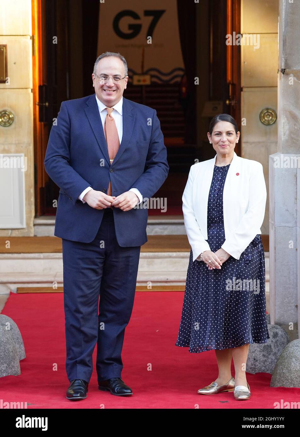 Home Secretary Priti Patel welcomes Michael Ellis QC MP to a reception ...
