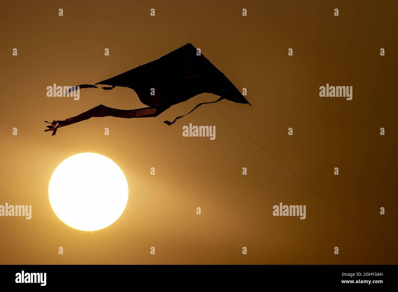 Blackpool, UK. 07th Sep, 2021. Children fly a kite on Blackpool sands ...