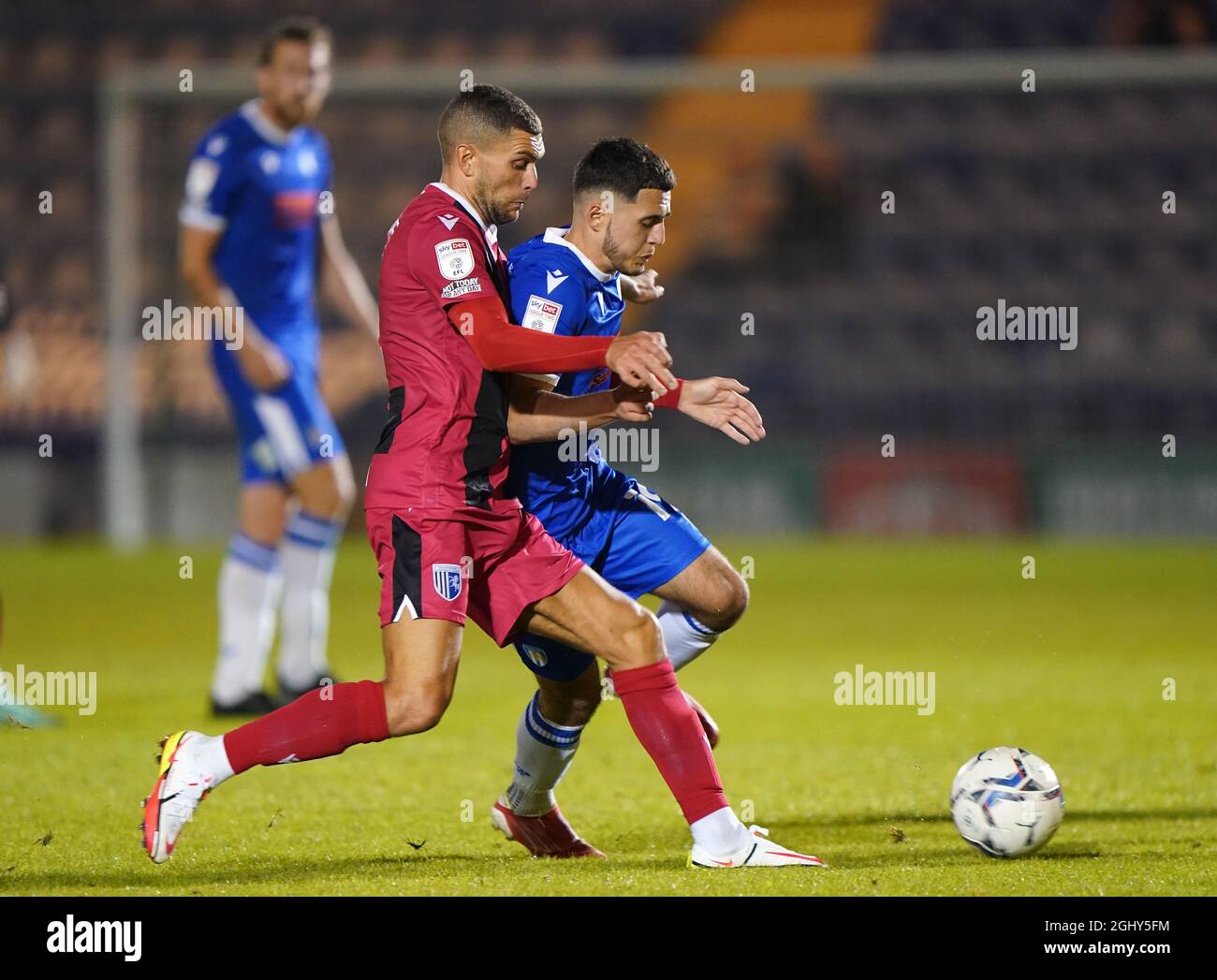 Gillingham's Stuart O'Keefe (left) and Colchester United's Armando ...