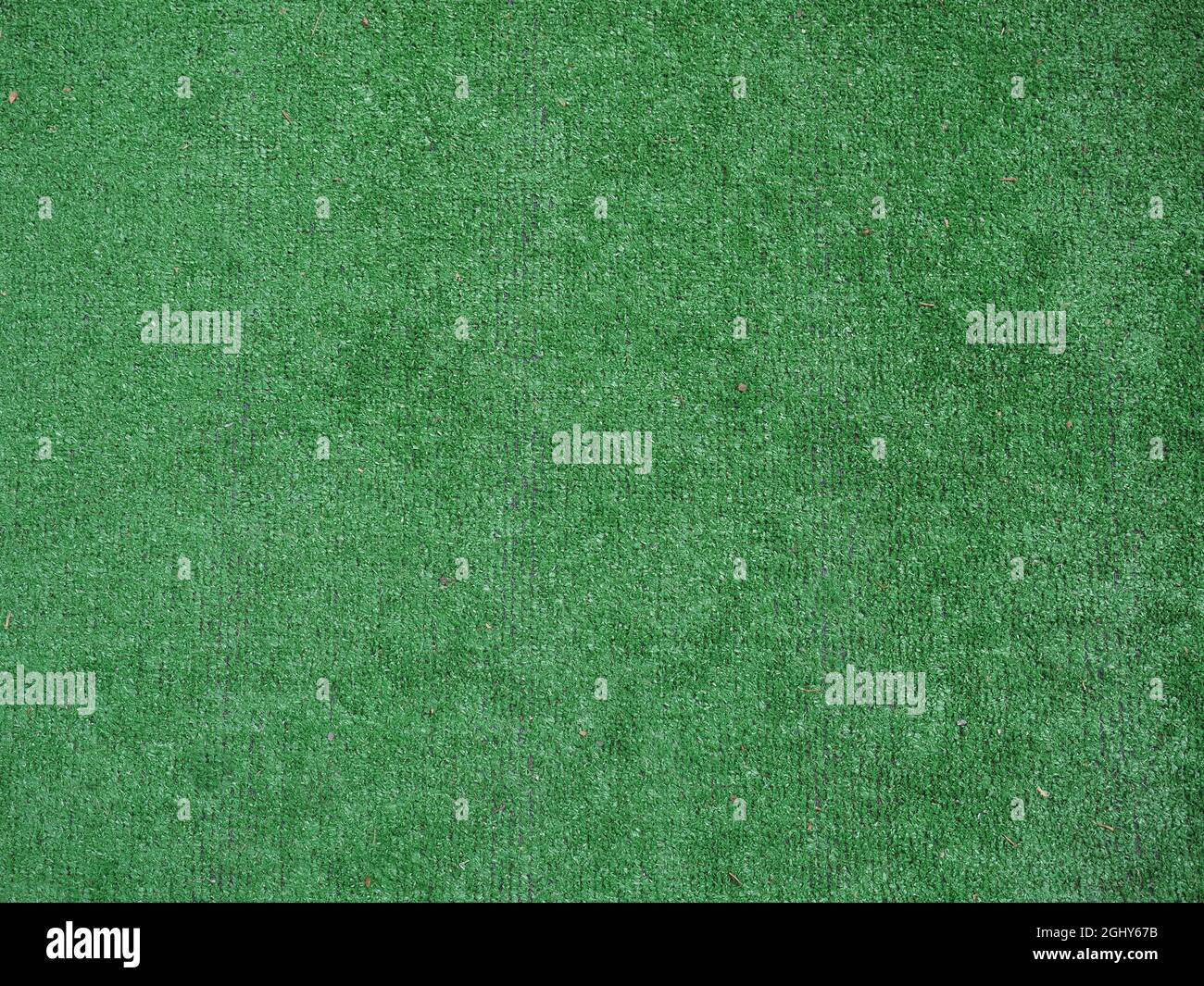 green synthetic grass texture useful as a background Stock Photo - Alamy