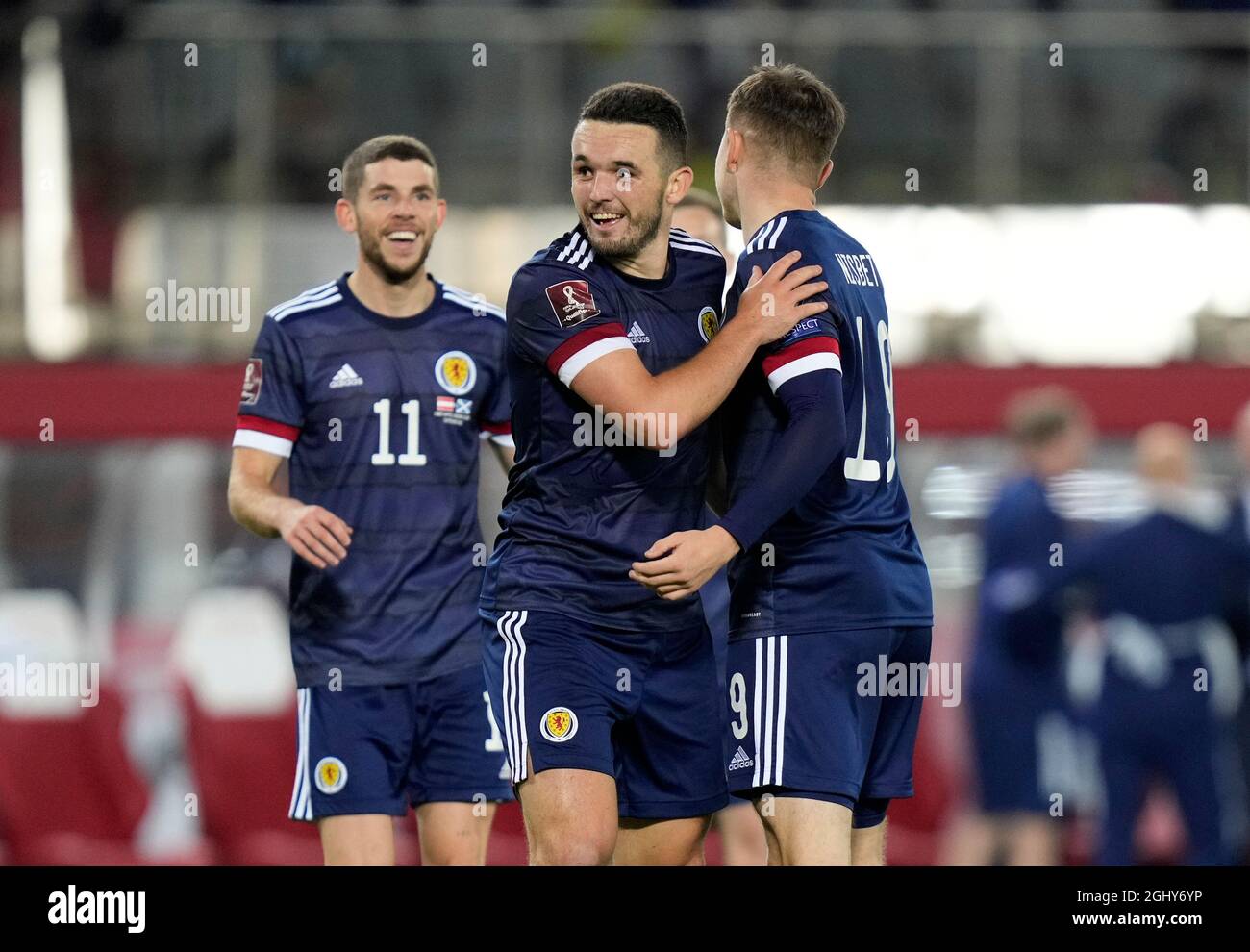 Scotland's John McGinn and Kevin Nisbet celebrate victory during the ...