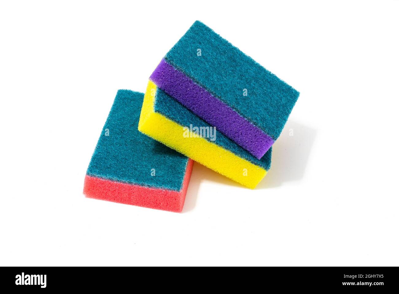 multi-colored sponges for washing dishes on a white background Stock ...