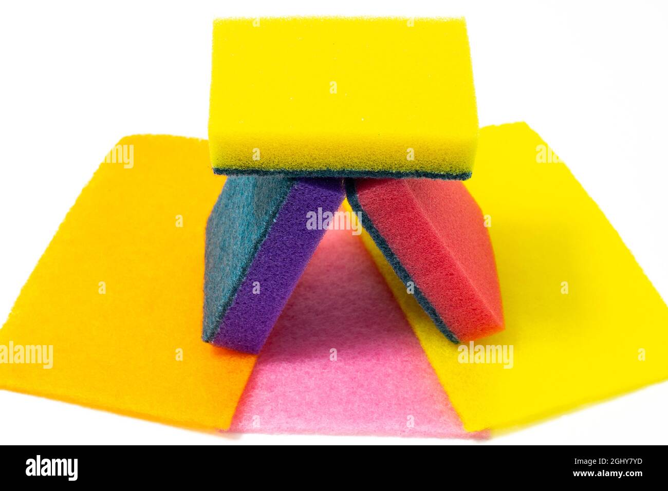 foam sponges for cleaning the house and washing dishes are folded, on a ...