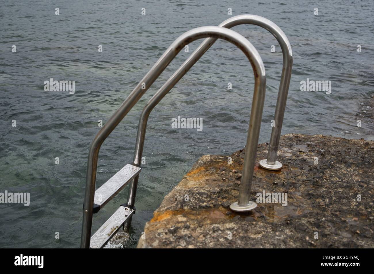 Metallic ladder on beach hi-res stock photography and images - Alamy