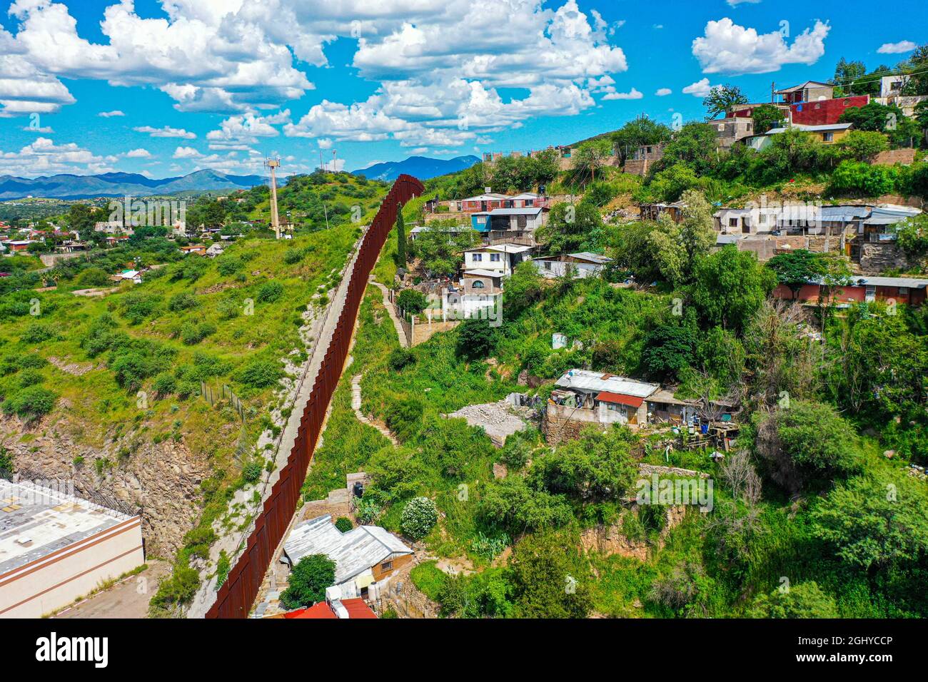 Aerial view of the border wall in Nogales Sonora (R) in Mexico and ...