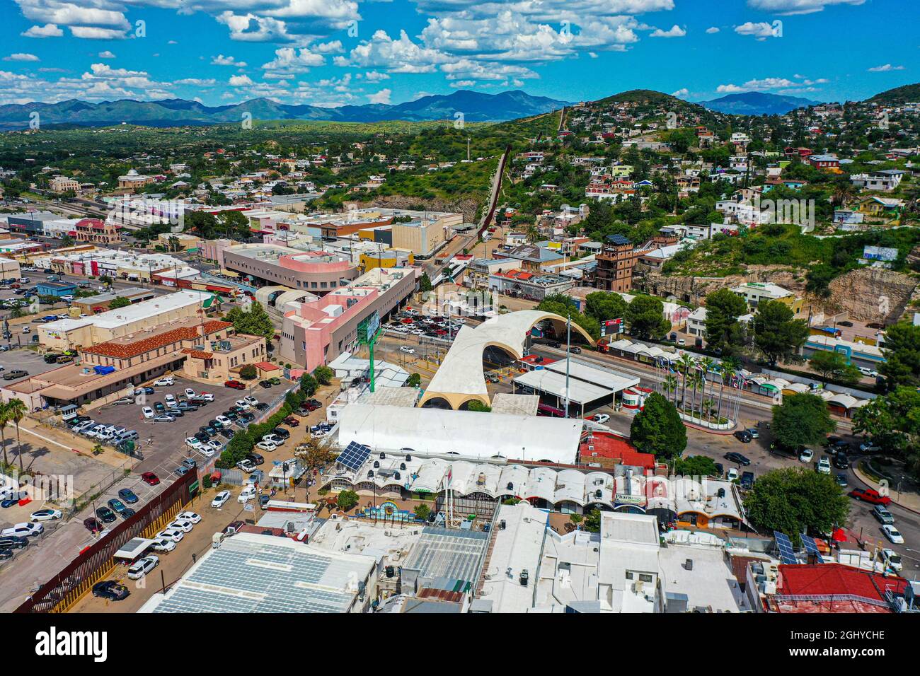 Border wall and gatehouse in Nogales Sonora in Mexico and Nogales ...