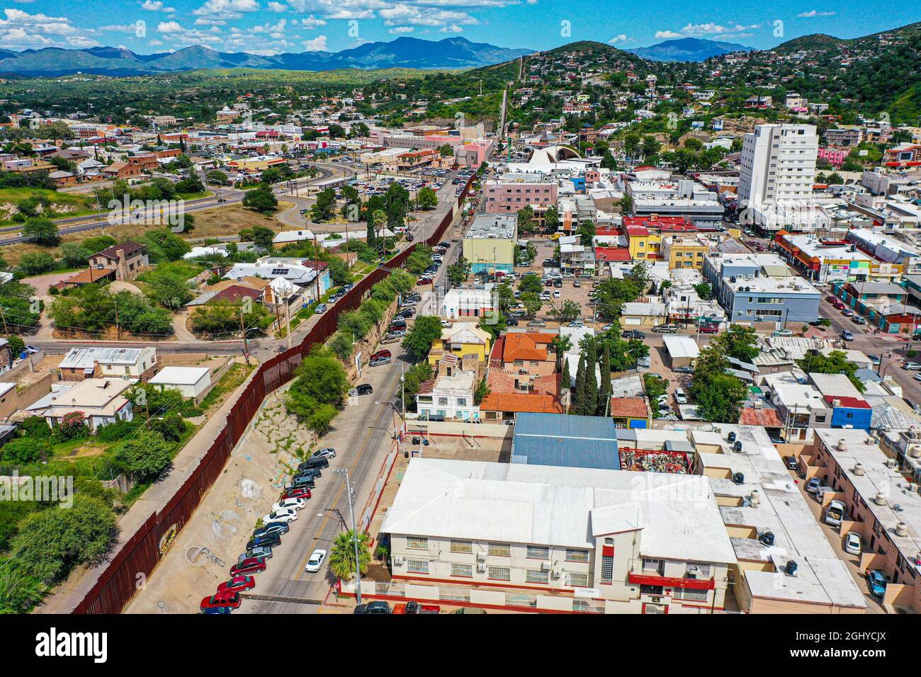 Border wall and Hotel Fray Marcos de Niza hotel in Nogales, Sonora ...