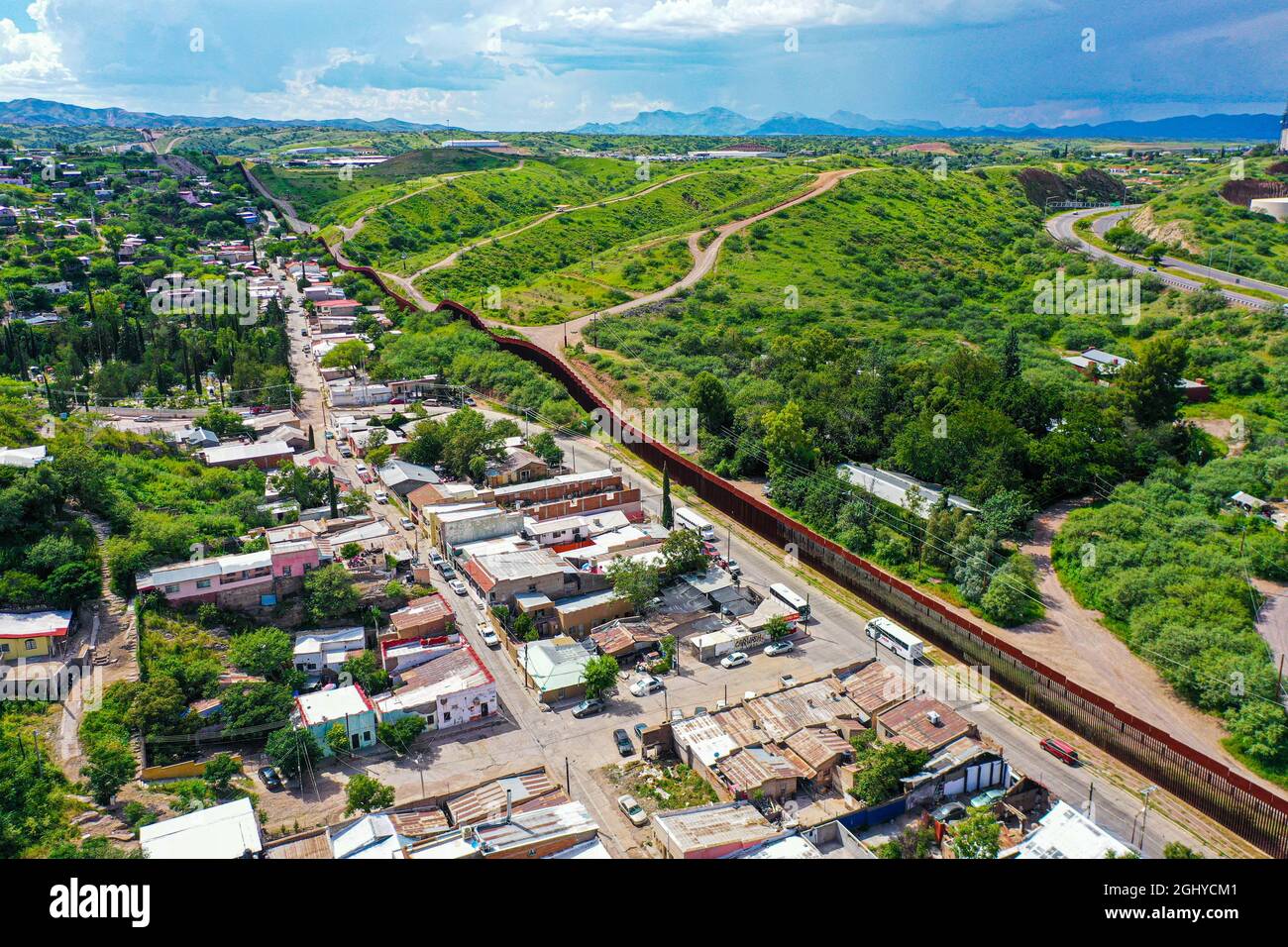 Aerial view of the border wall in Nogales Sonora (L) in Mexico and ...