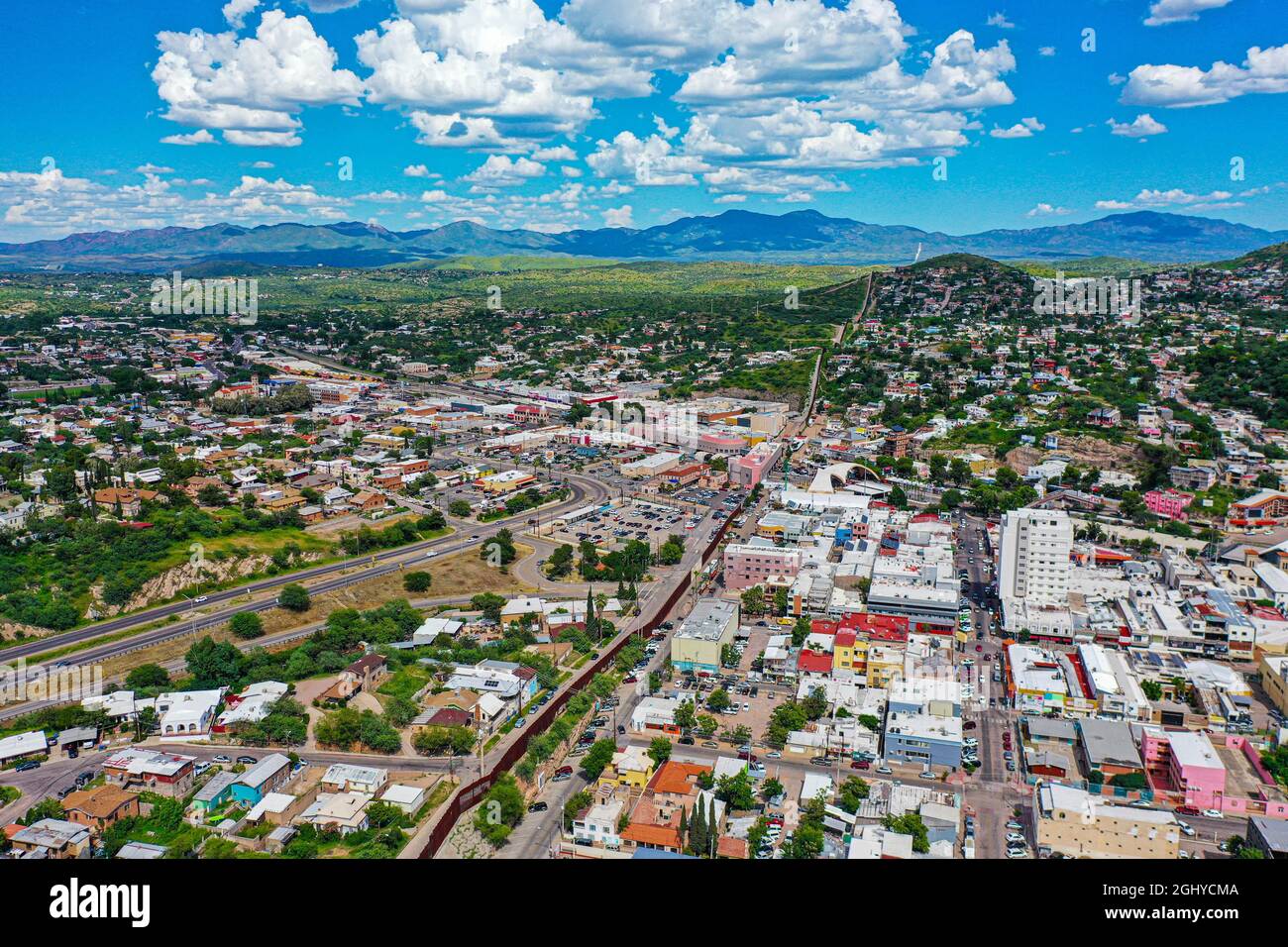 Aerial view of the border wall in Nogales Sonora (R) in Mexico and ...
