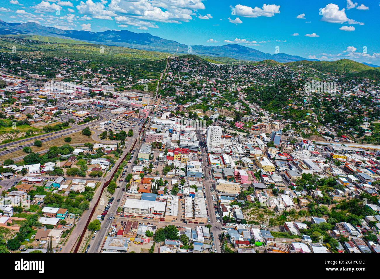 Aerial view of the border wall in Nogales Sonora (R) in Mexico and ...
