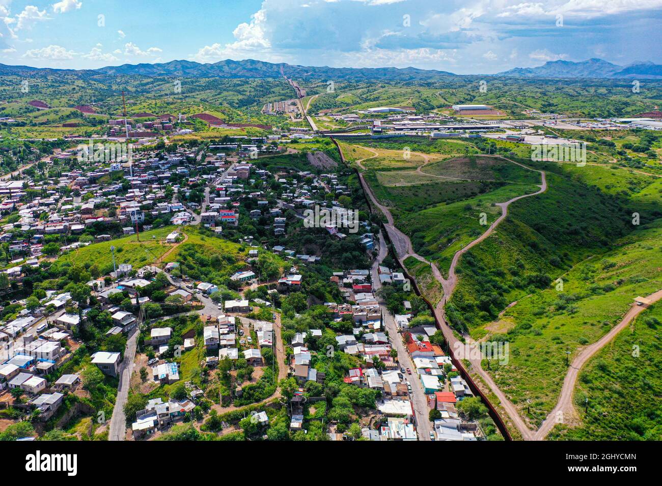 Aerial view of the border wall in Nogales Sonora (L) in Mexico and ...