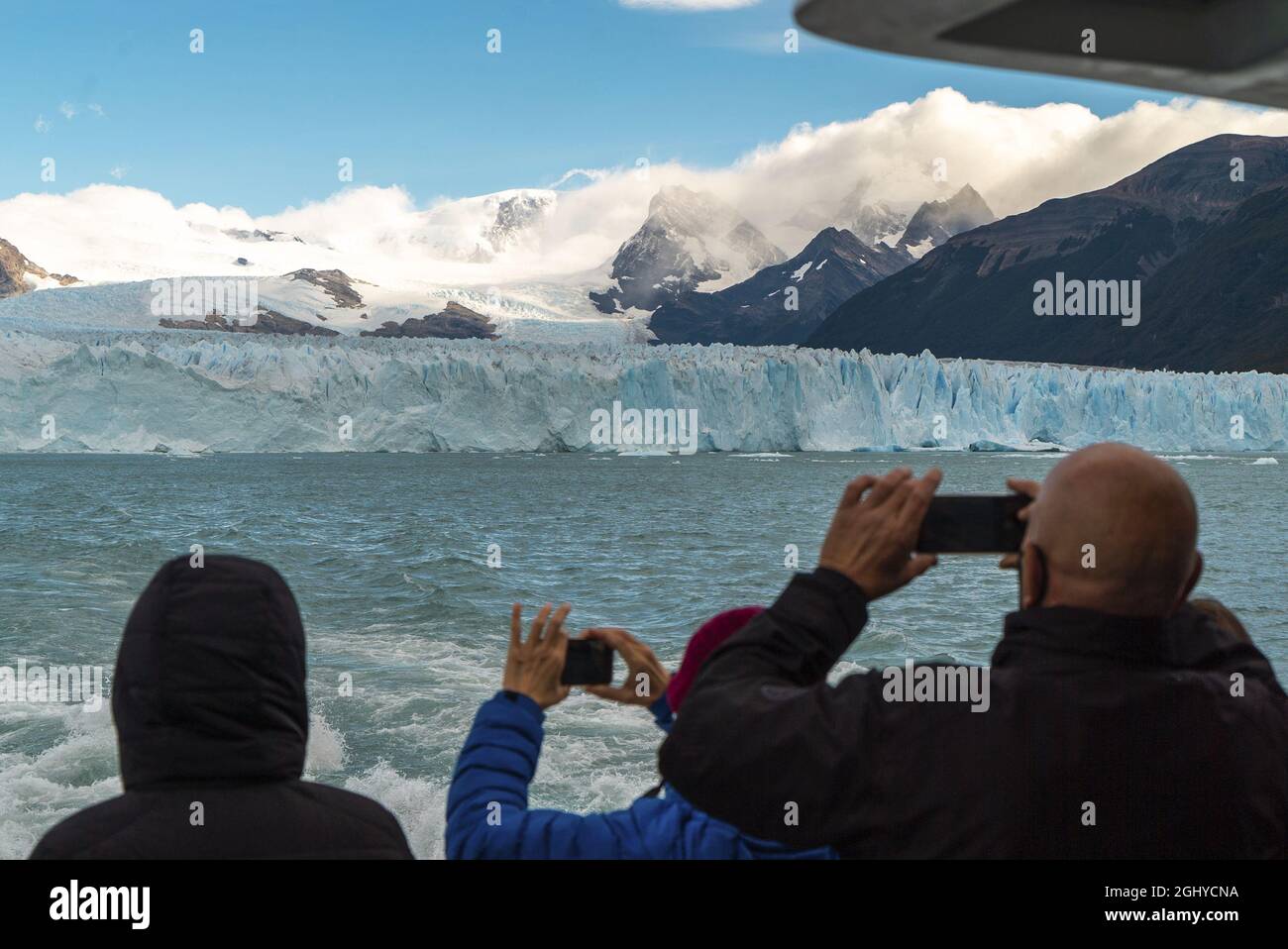 Tourist taking picture perito moreno glacier boat hi-res stock ...