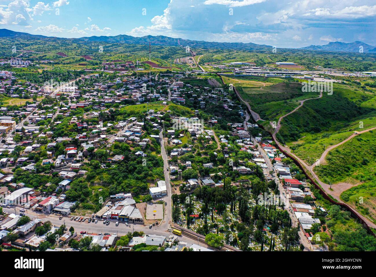 Aerial view of the border wall in Nogales Sonora (L) in Mexico and ...
