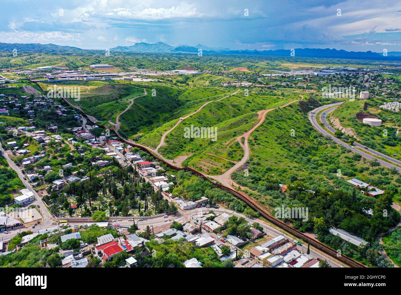 Aerial view of the border wall in Nogales Sonora (L) in Mexico and ...