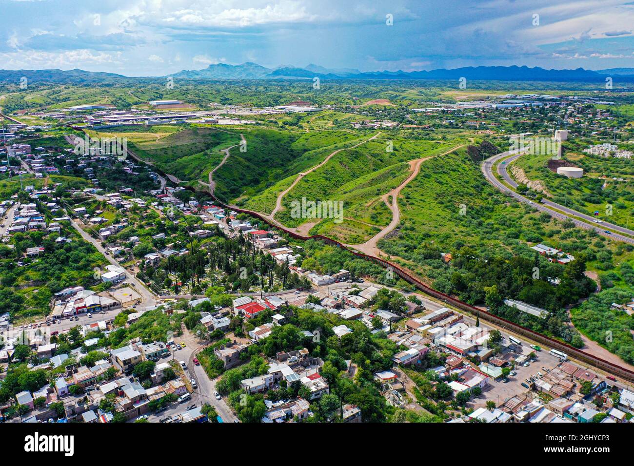 Aerial view of the border wall in Nogales Sonora (L) in Mexico and ...