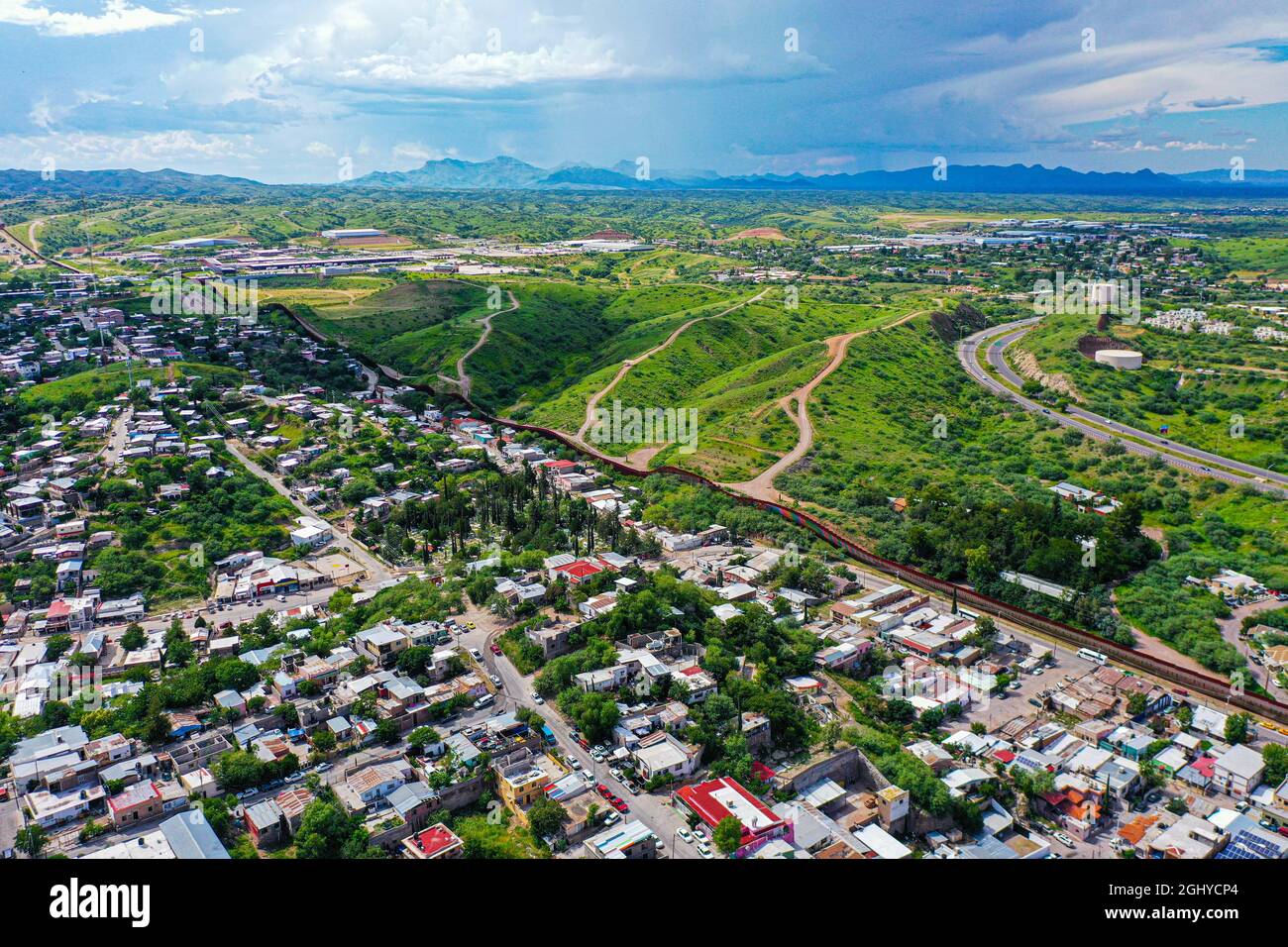 Aerial view of the border wall in Nogales Sonora (L) in Mexico and ...
