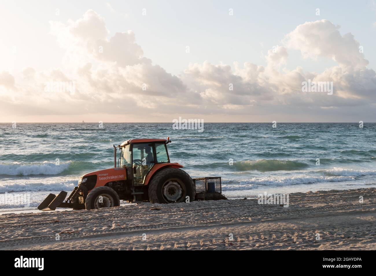 Sand cleaning machine at the beach in Miami, Florida Stock Photo - Alamy