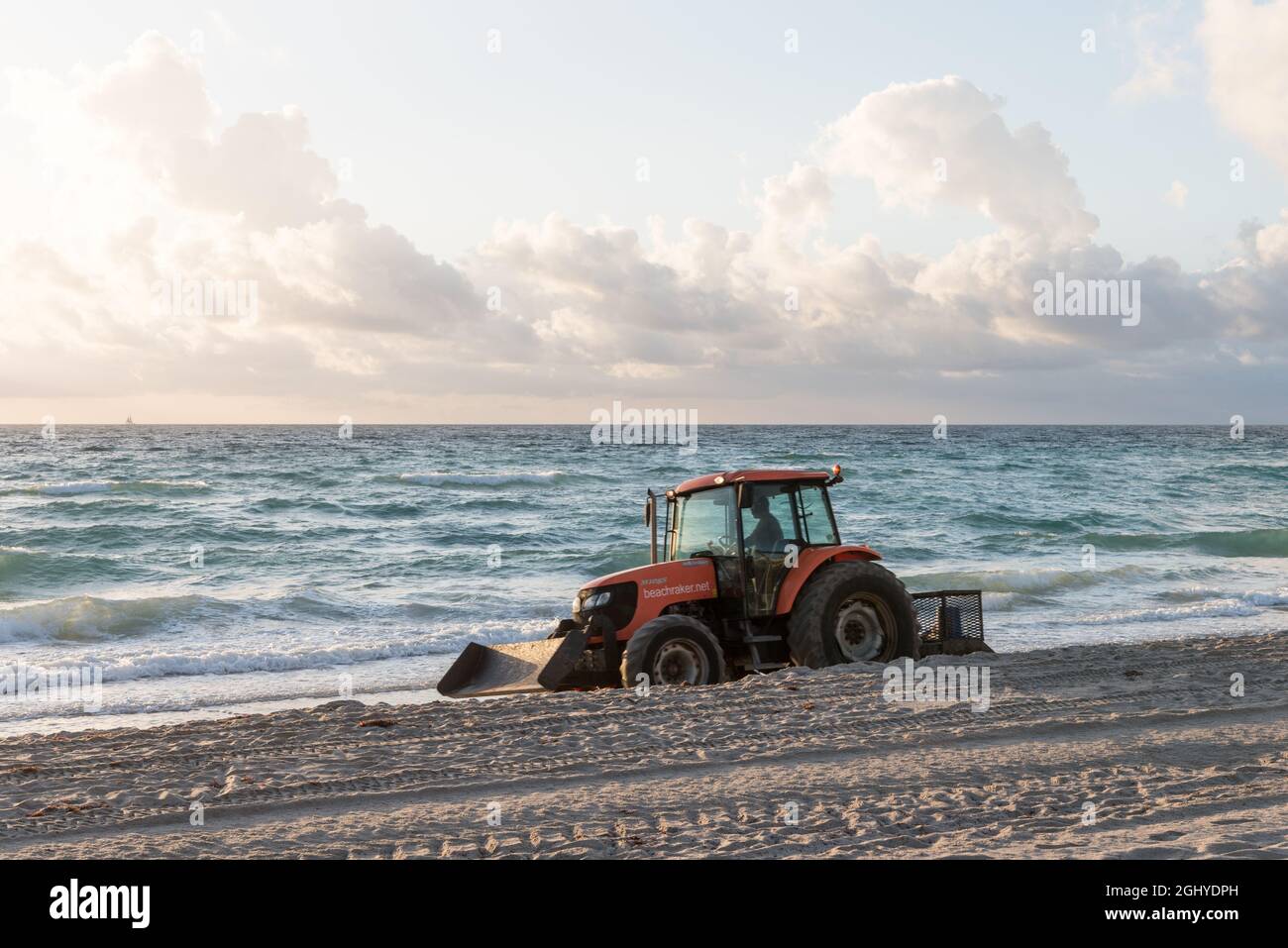 Sand cleaning machine at the beach in Miami, Florida Stock Photo - Alamy
