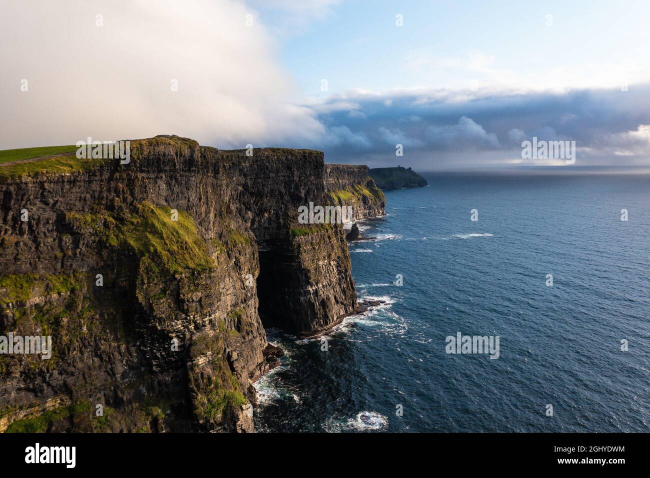Famous Irish cliffs of Moher in west coast of Ireland with calm and sea ...