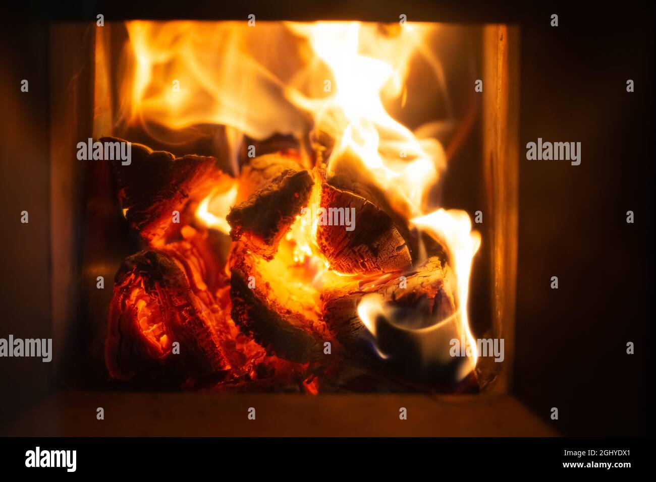 Close-up on fire and coals in the fireplace of a country house Stock ...