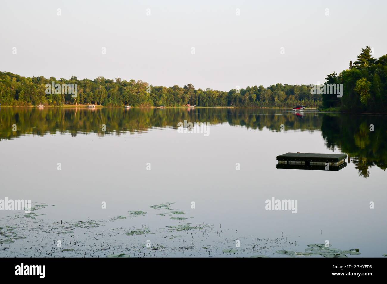 lake water reflections along the shore Stock Photo - Alamy