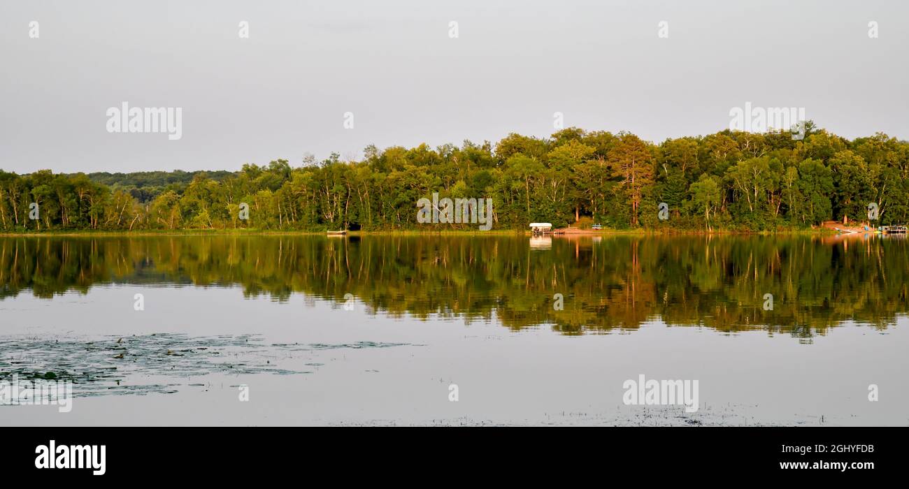lake water reflections along the shore Stock Photo - Alamy