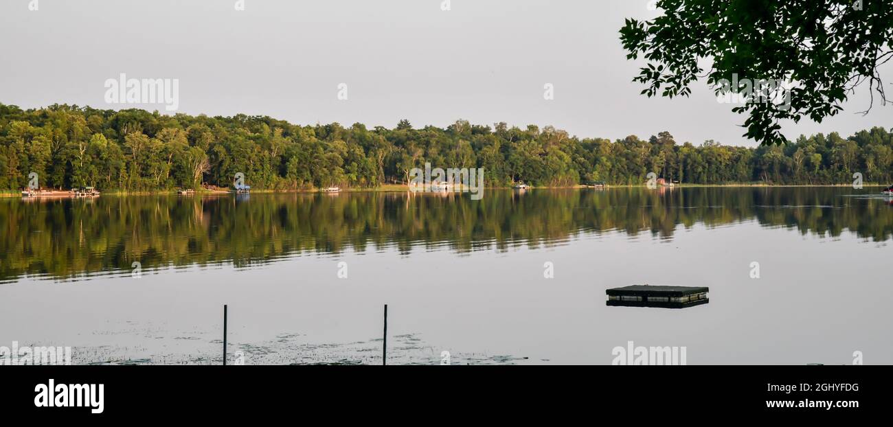lake water reflections along the shore Stock Photo - Alamy