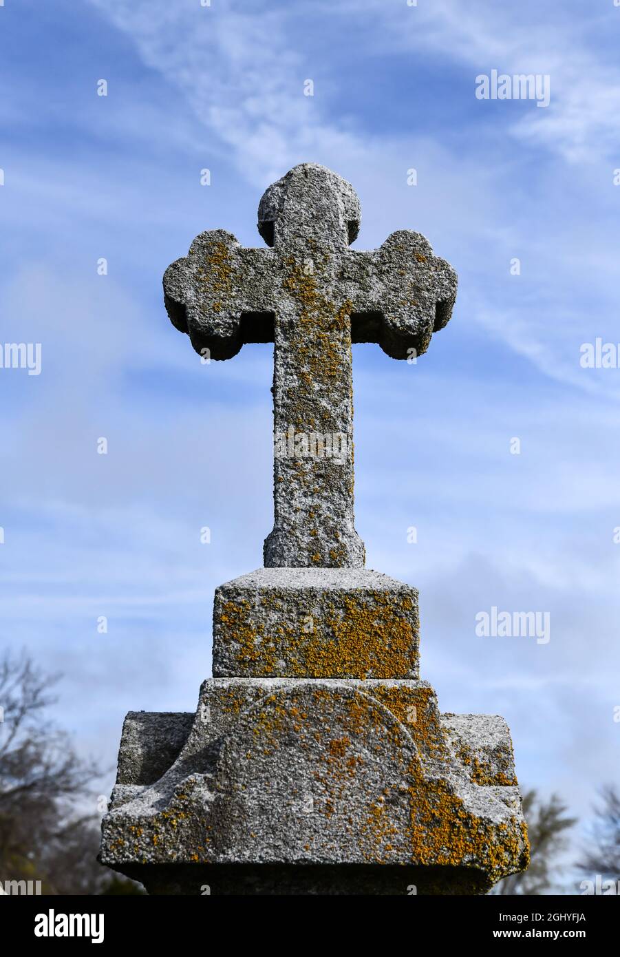 cemetery grave cross and statue Stock Photo - Alamy