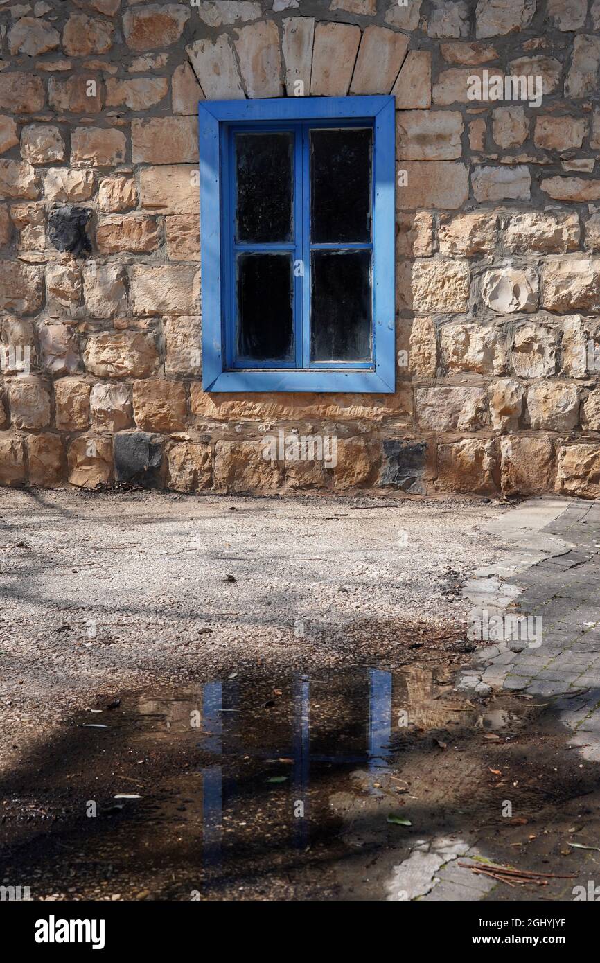 Old rock wall and wooden window frame Stock Photo - Alamy