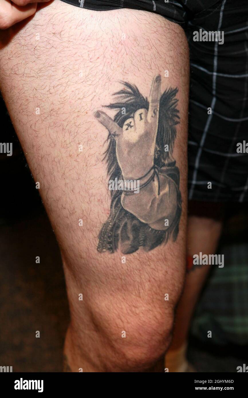 Fan showing tattoo hi-res stock photography and images - Alamy