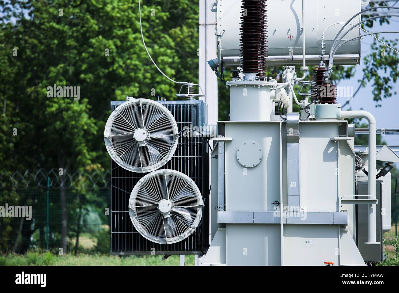 Fan at a power plant against the background of greenery Stock Photo - Alamy
