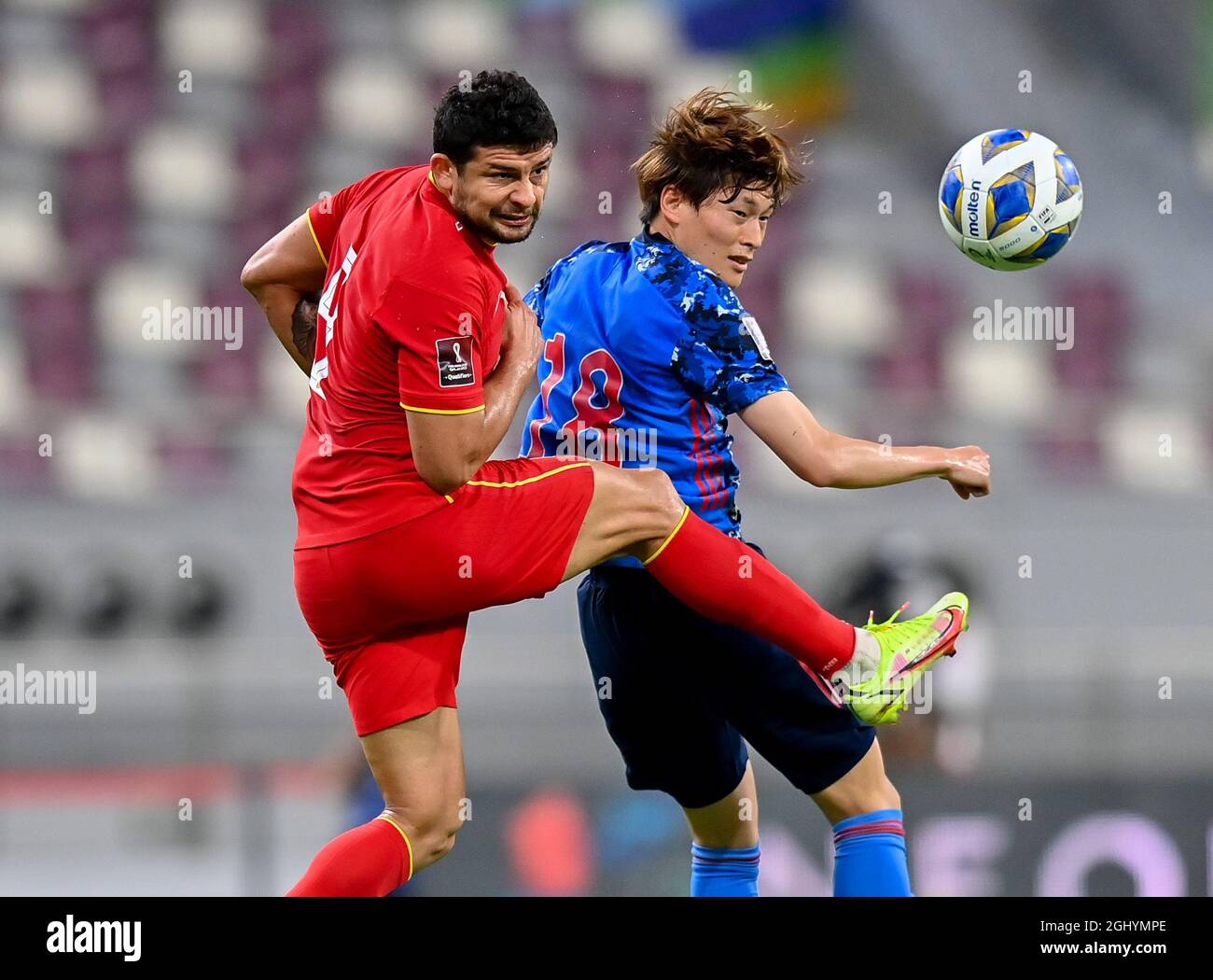 Doha, Qatar. 7th Sep, 2021. Ai Kesen (L) of China vies with Furuhashi ...