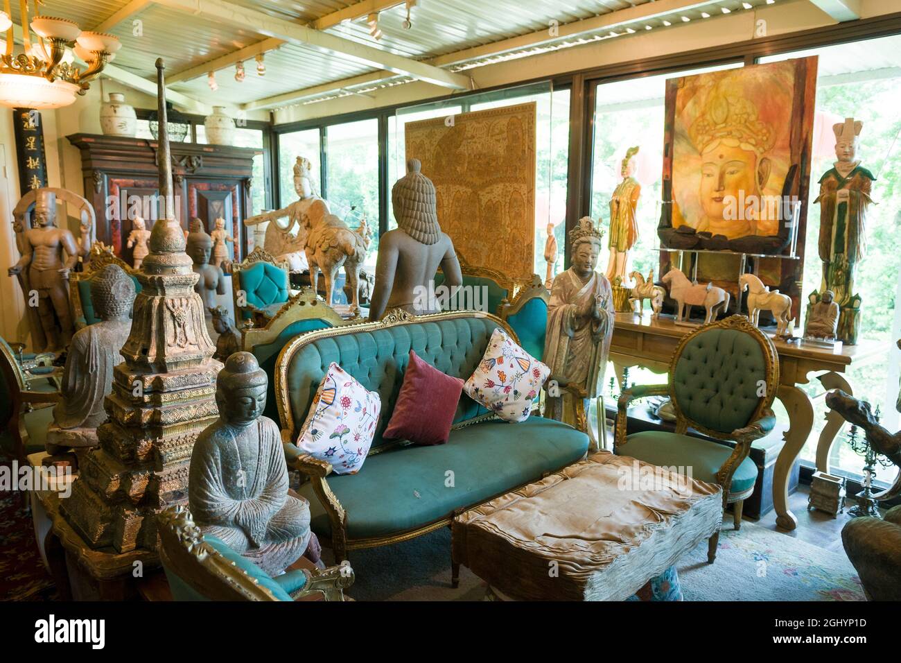 Part of the eclectic collection of Chinese sculptures in the house of ...