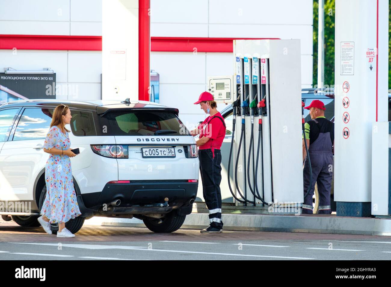 Voronezh. Russia. July 23, 2021. A female tanker in uniform fills the ...