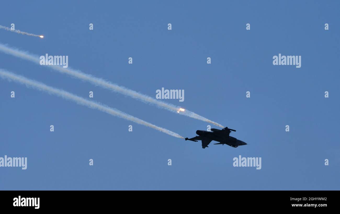 Maribor Slovenia AUGUST, 15, 2021 Military aircraft releases flares ...