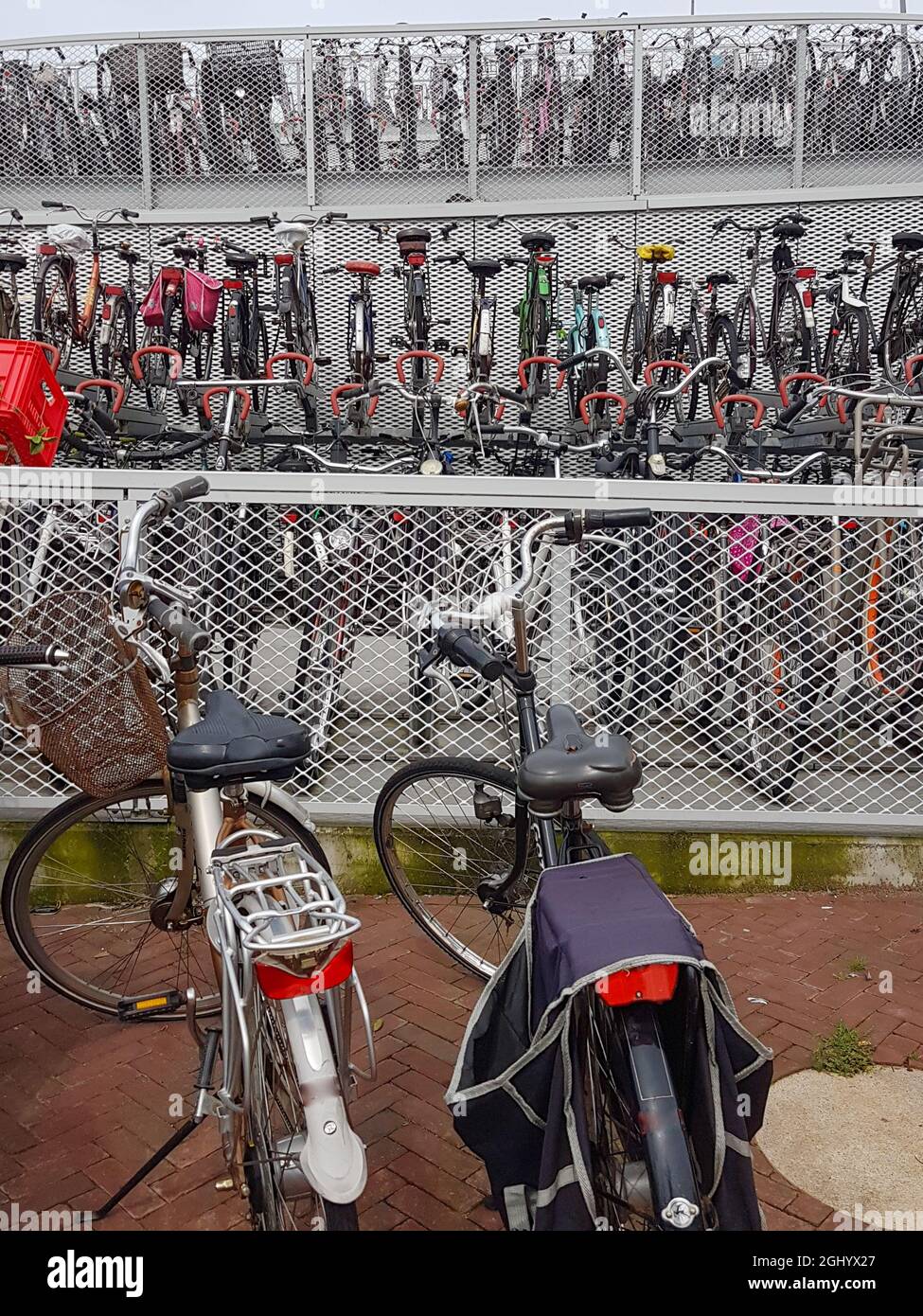 Rows of bicycles in urban Dutch bike rack Stock Photo - Alamy