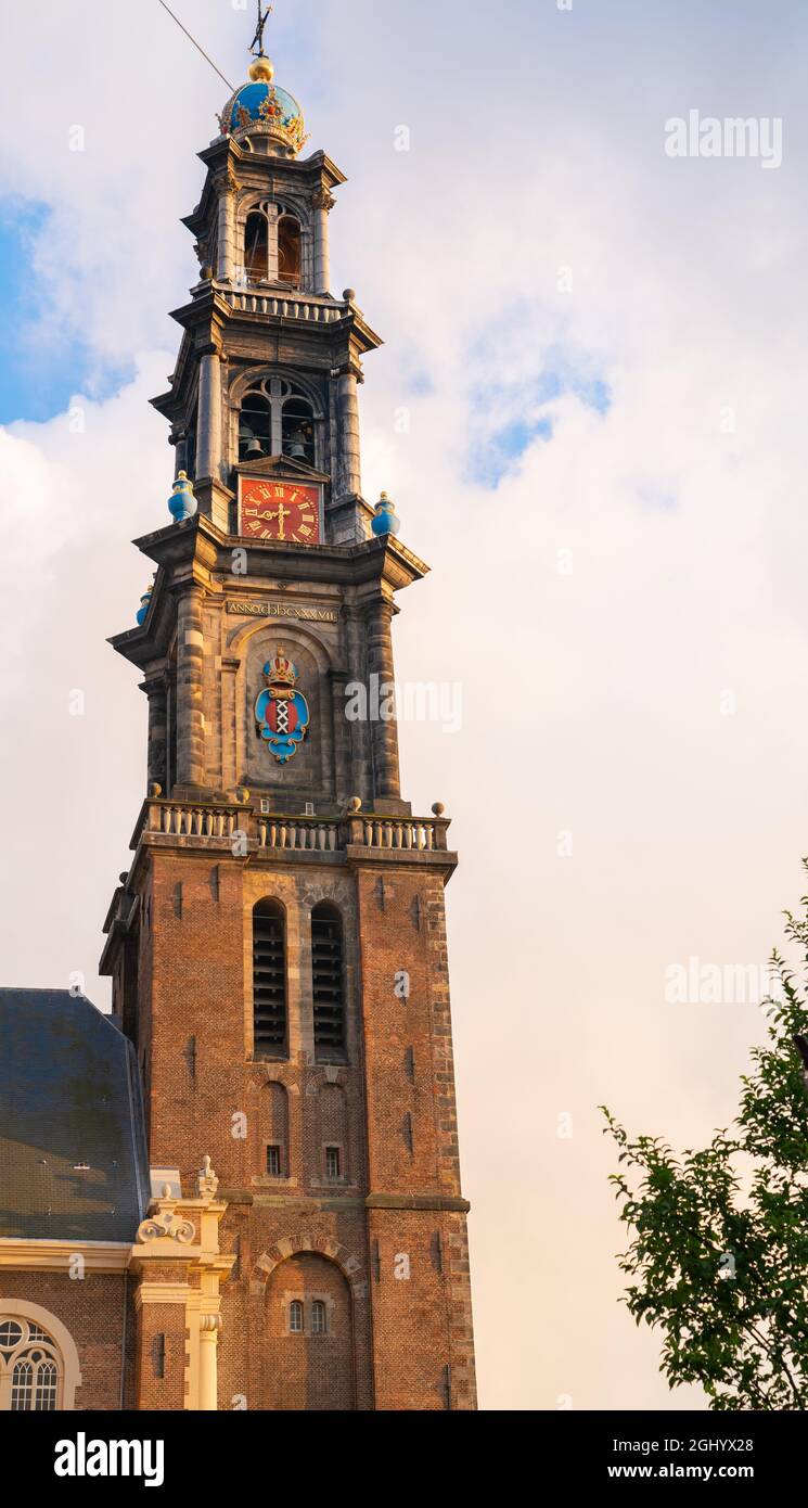 Tall church tower rising skyward with Gothic architectural detail in ...