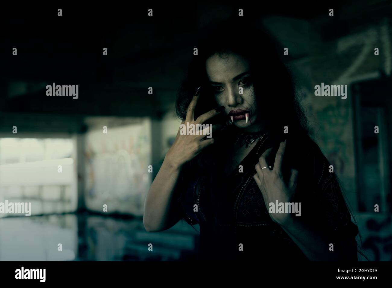 Blurry Vampires Woman in upset moody with bloody lips.Hunting prey in ...