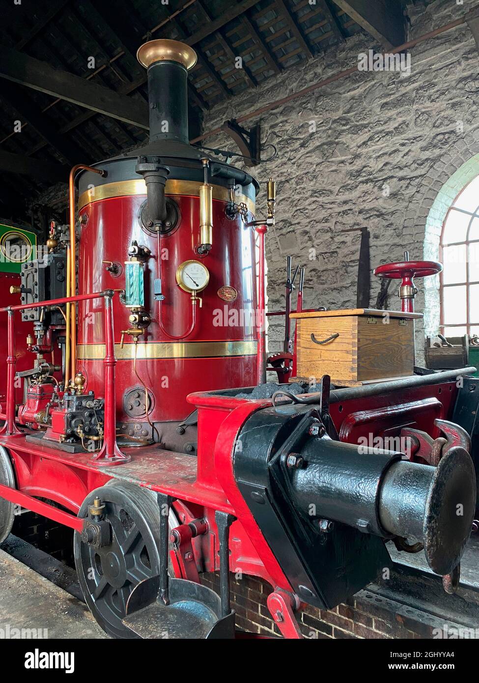 An old steam locomotive in an engine shed at Beamish Open Air Museum in ...